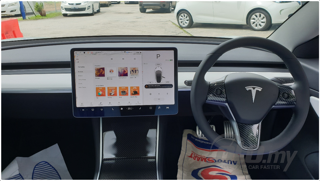 Iklan kereta elektrik Tesla Model 3 mula kelihatan di Malaysia ...
